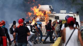 Flames, fatality at Venezuela demo over leader's crisis maneuver | SBS News