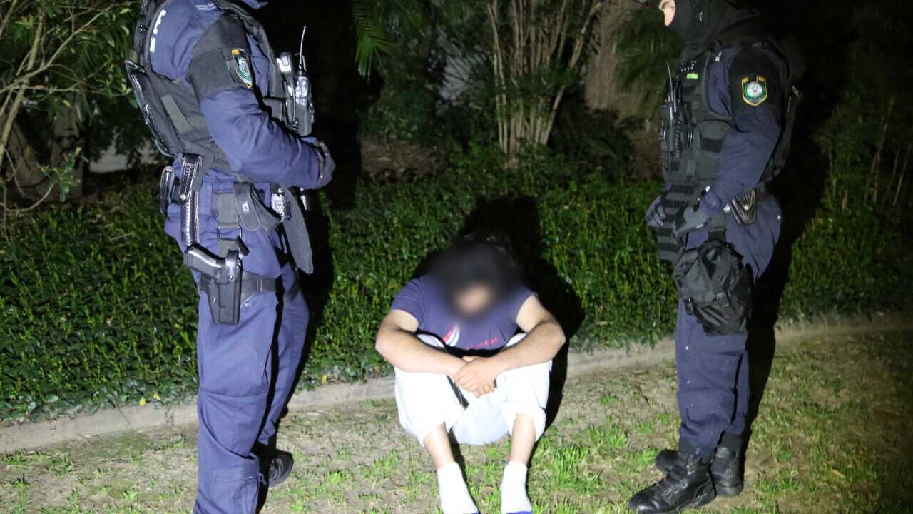 Counter-terror raids net multiple suspects in Sydney, Brisbane | SBS News